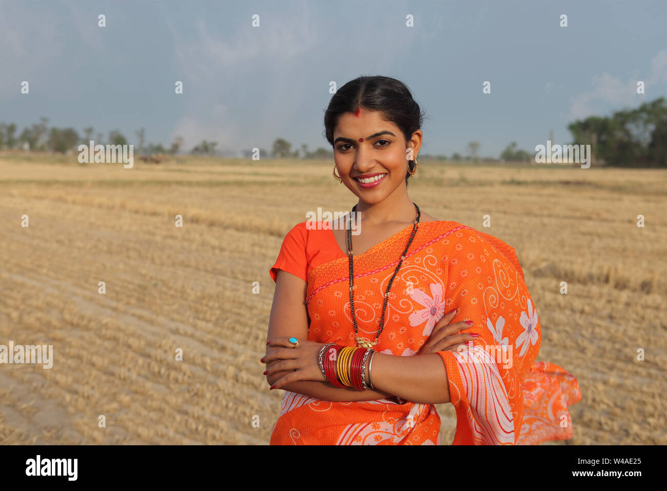 Portrait of a rural woman smiling Stock Photo - Alamy