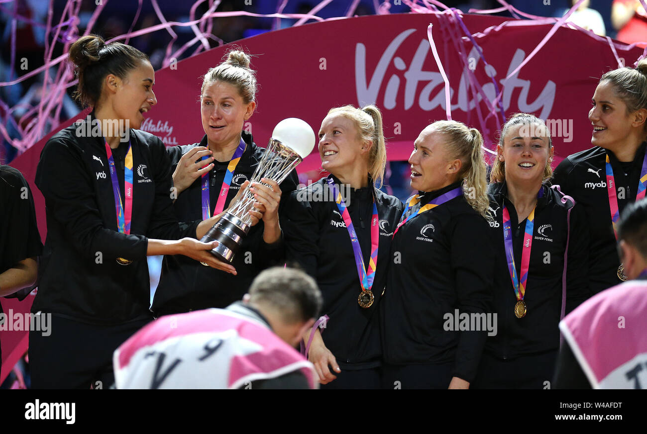 New Zealand's Maria Folau (left) celebrates with the trophy after ...