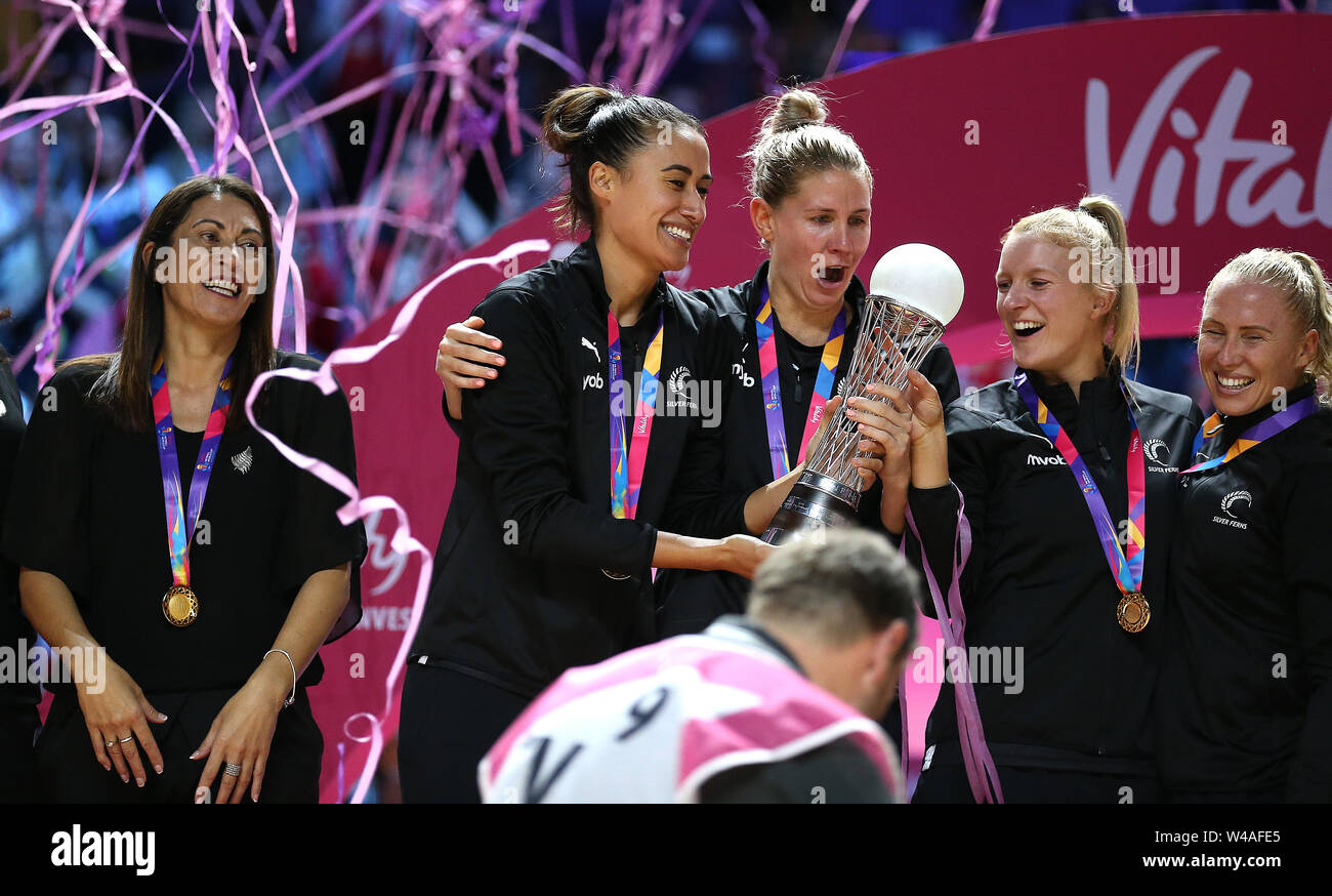 New Zealand's Maria Folau (centre) celebrates with the trophy after ...