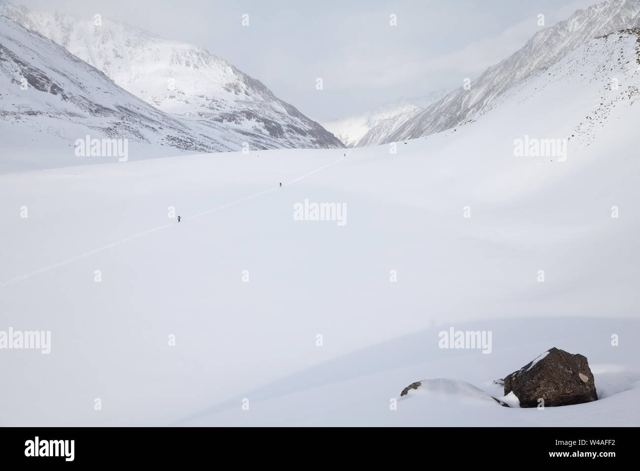 Backpacking ski tour climbers in Altay high mountains. Siberia. Russia ...
