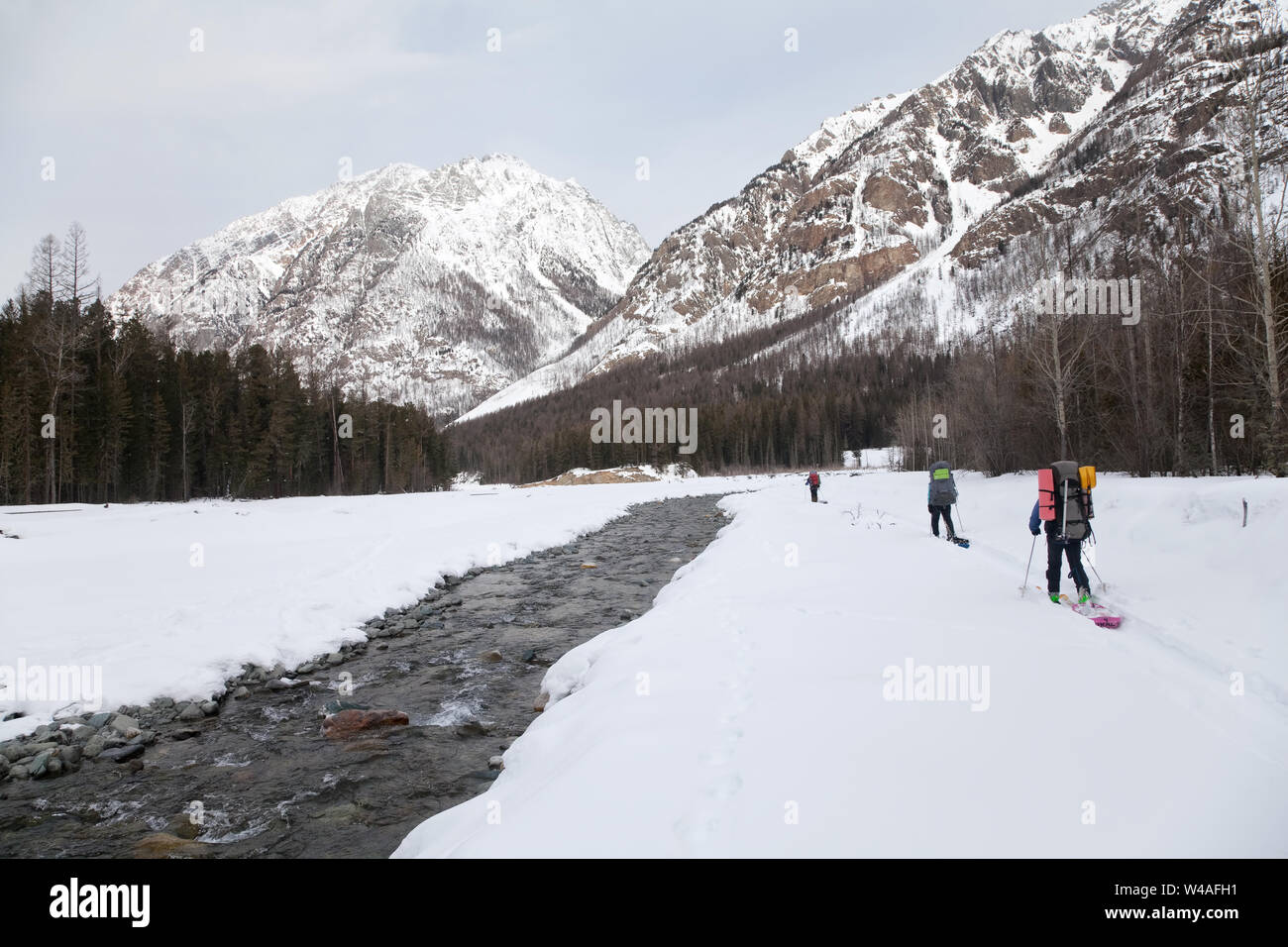 Backpacking ski tour climbers in Altay high mountains. Siberia. Russia ...