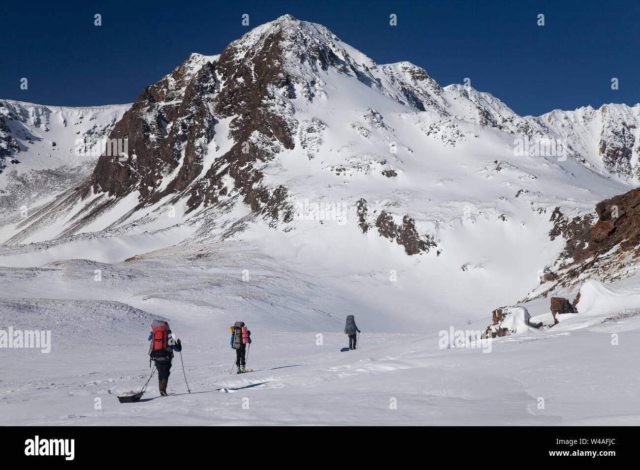 Backpacking ski tour climbers in Altay high mountains. Siberia. Russia ...