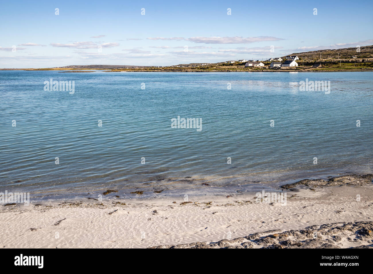 Beach in Kilronan with houses in background in Inishmore, Aran Islands ...