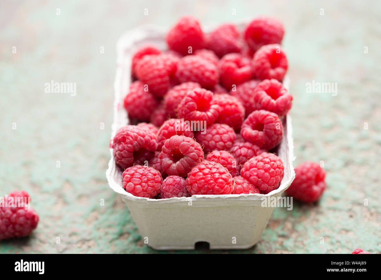 Freshly picked raspberries in box Stock Photo - Alamy