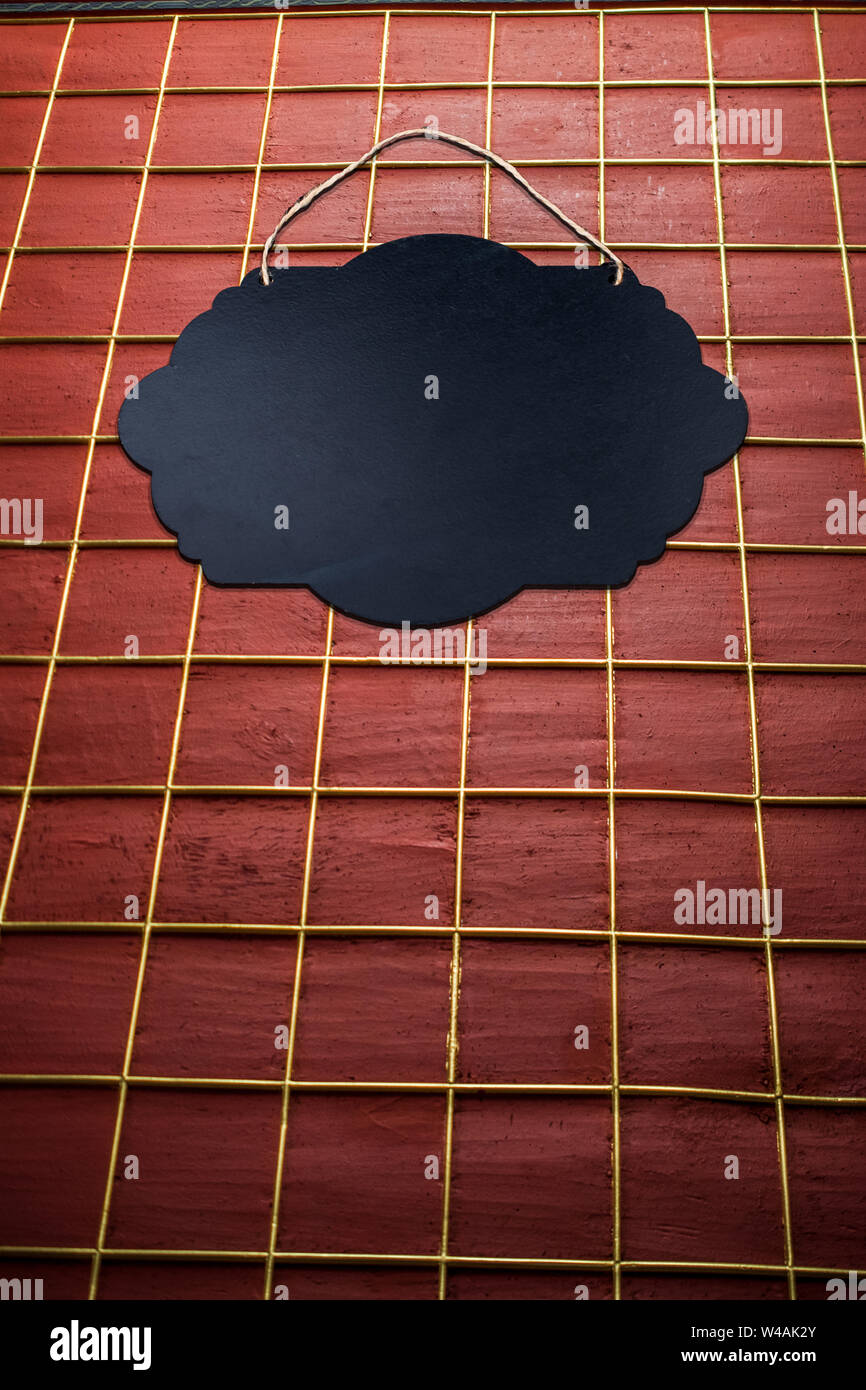 Black Empty Sign Board with string for hanging on wall Stock Photo - Alamy