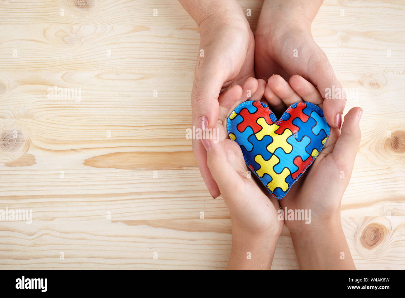 World Autism Awareness day, puzzle or jigsaw pattern on heart with ...