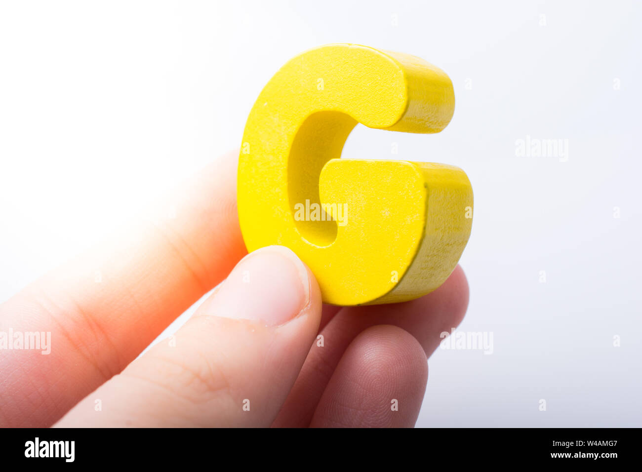 Letter cube of G of Alphabet made of wood Stock Photo - Alamy