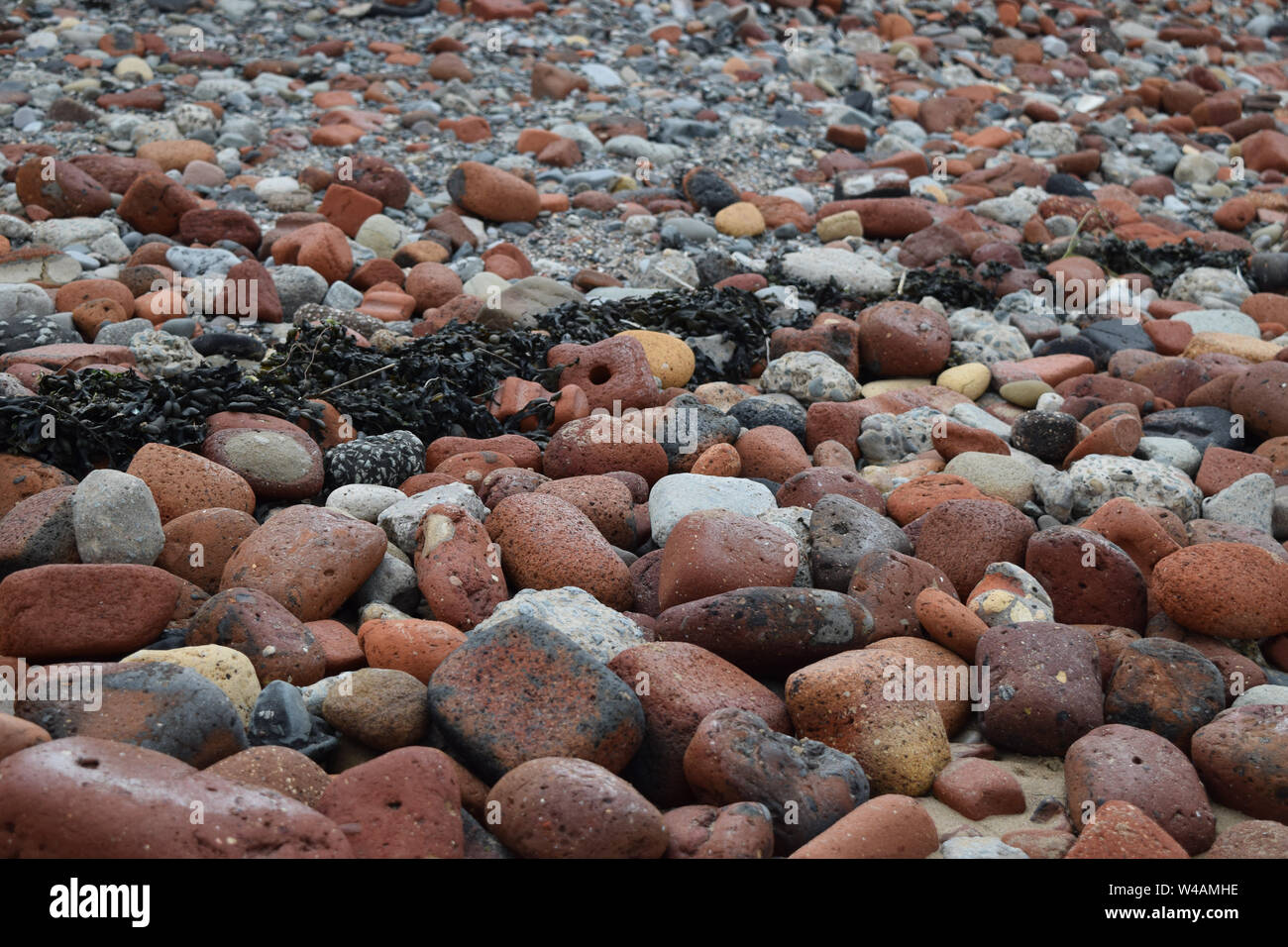Sea worn bricks Stock Photo - Alamy