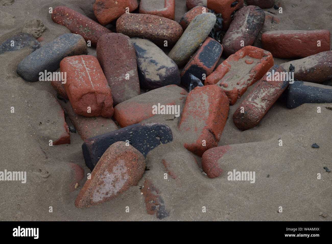 Sea worn bricks Stock Photo - Alamy