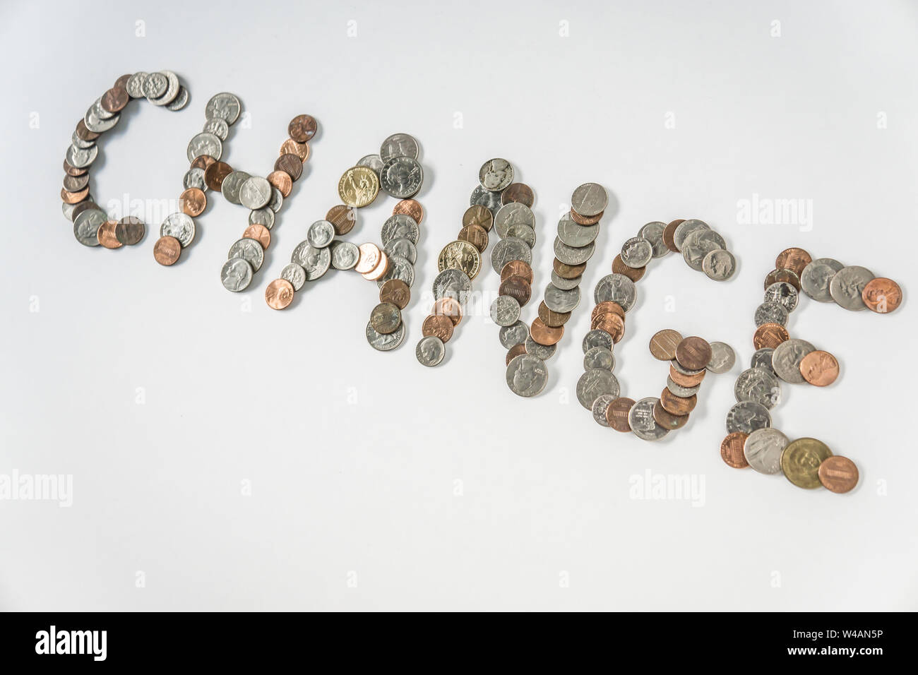 Coins isolated on solid white background spelling the word Change from ...