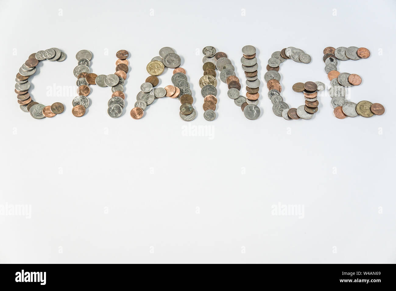 Coins isolated on solid white background spelling the word Change from ...