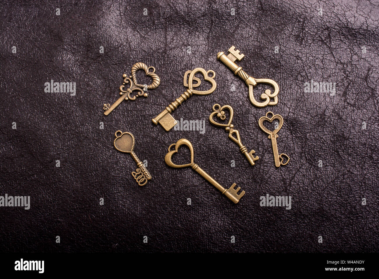 Heart shaped retro metal keys on dark background Stock Photo - Alamy