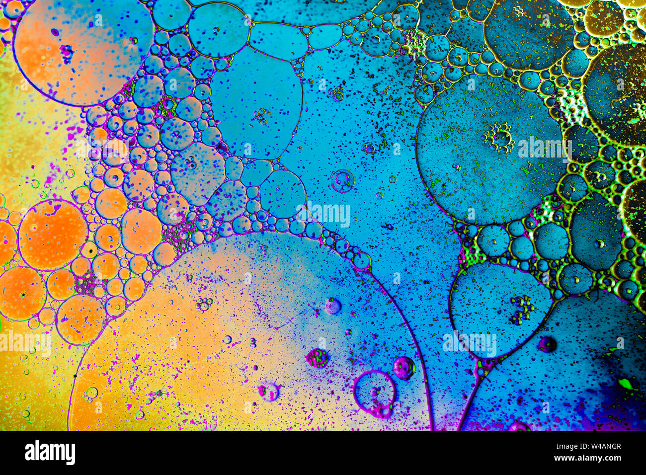 Oil bubbles inside water base form patterns Stock Photo - Alamy