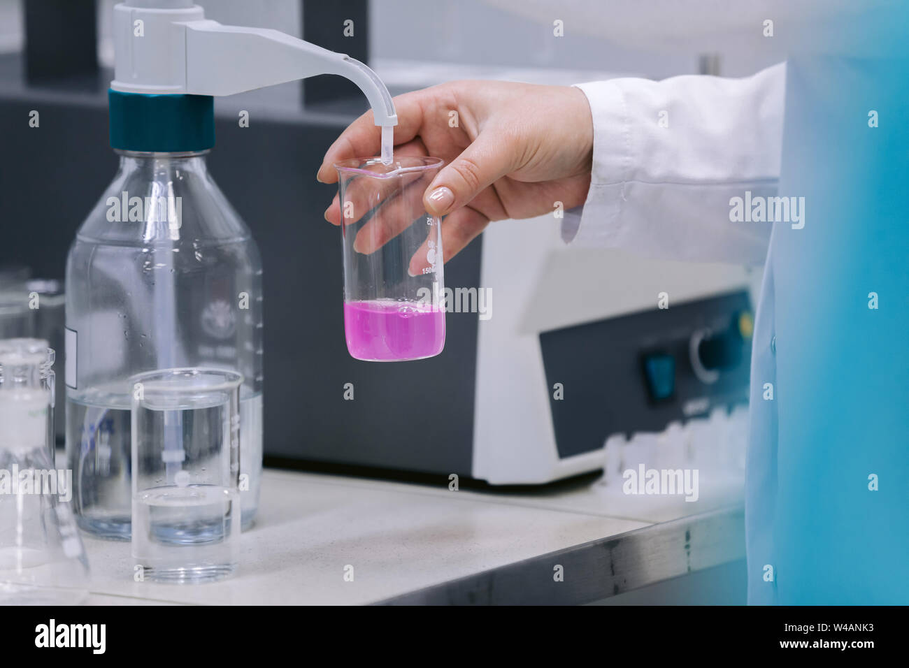Scientist holding a test tubes, Laboratory research. Scientist with ...