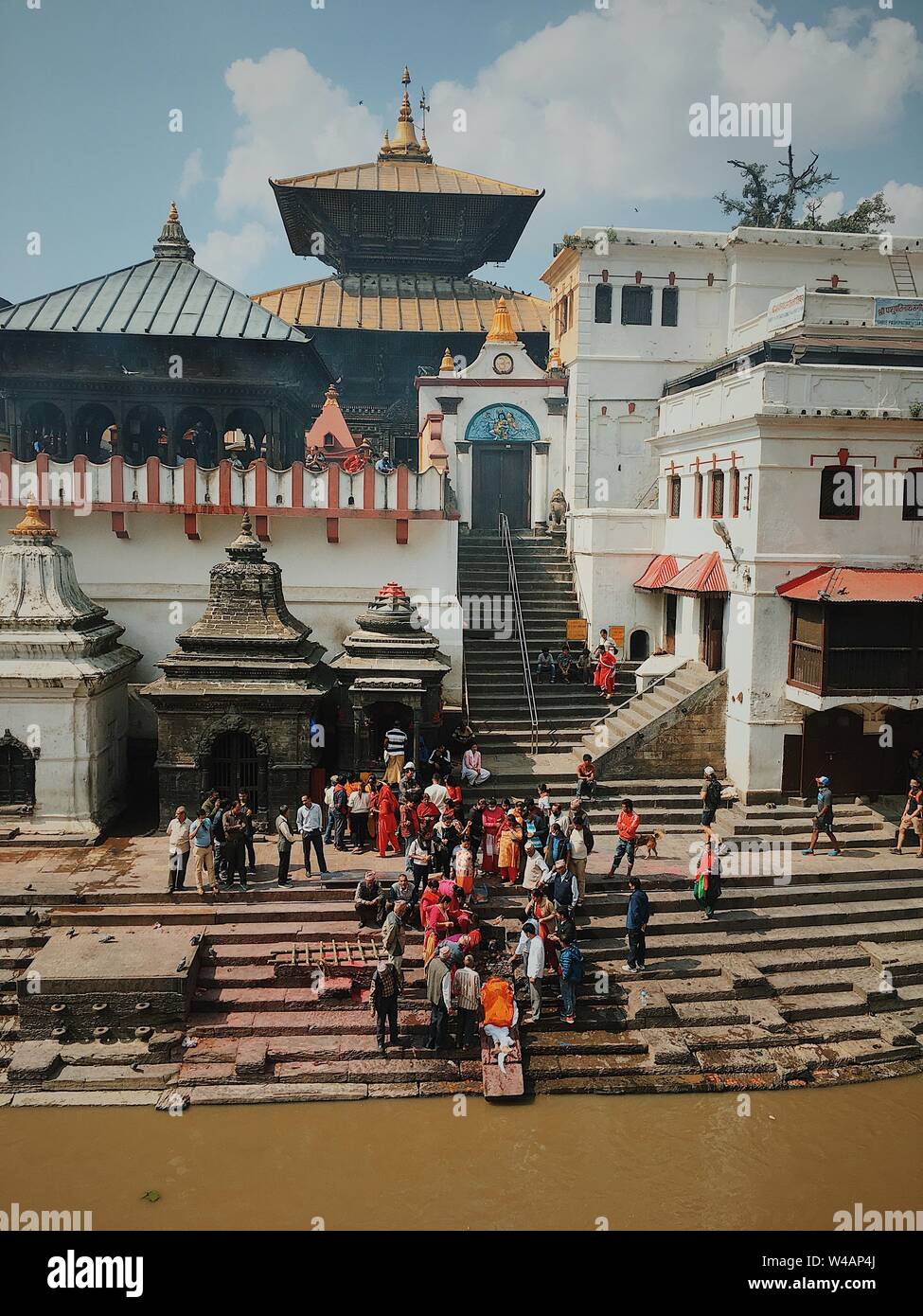 Colorful Asian funeral ceremony by river Stock Photo - Alamy