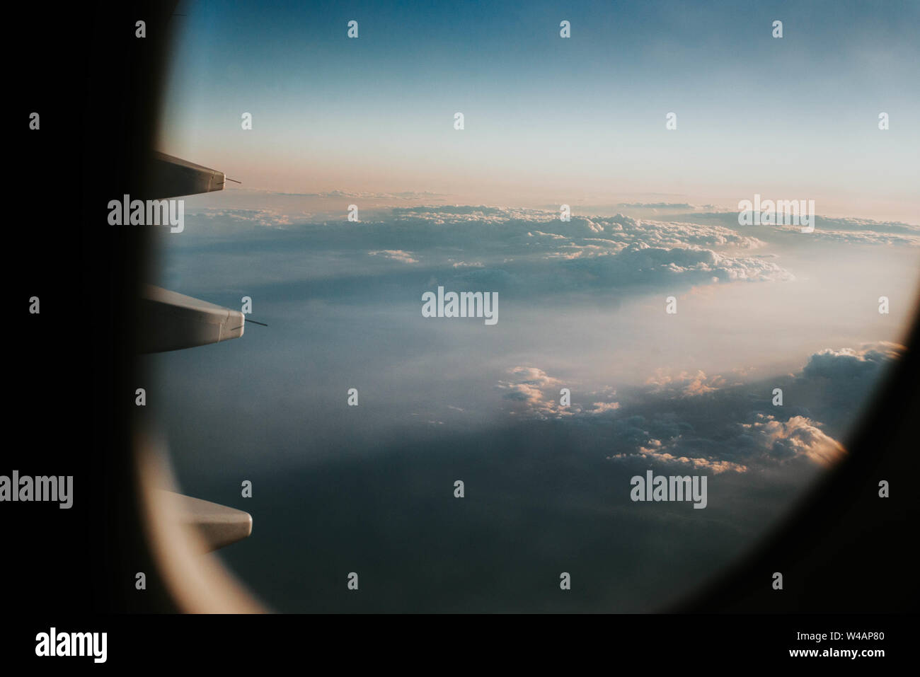 Clouds looking out airplane hi-res stock photography and images - Alamy