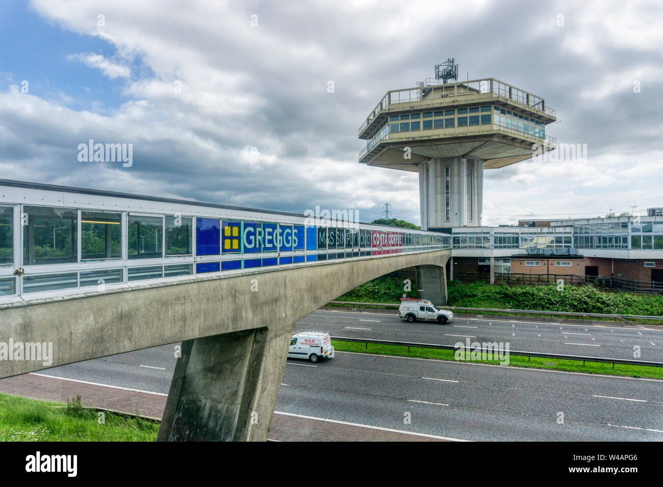 Brutalist architecture of the all weather enclosed bridge across the M6 ...