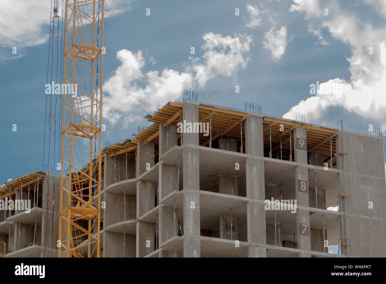 Modern building under construction detail, concrete frame, indow ...