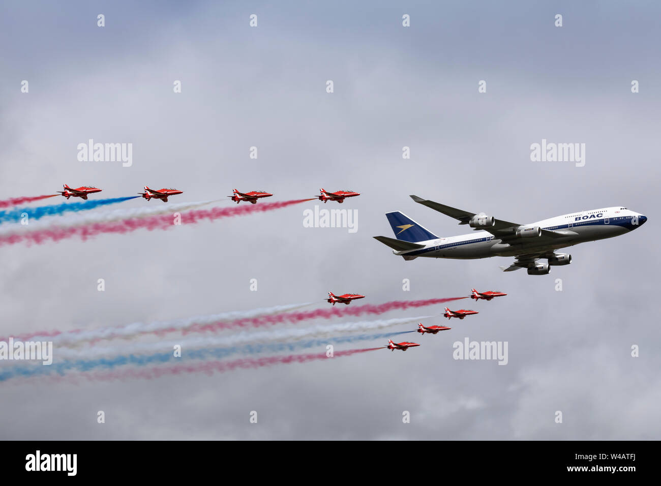Red Arrows formation flight with British Airways BOAC livery Boeing 747 ...
