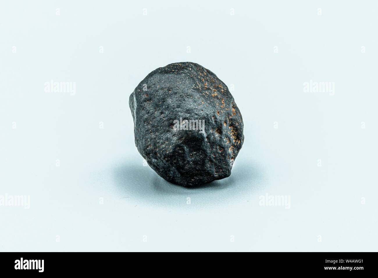 Black magnetic Tektite Meteorite isolated, piece of rock formed in big ...