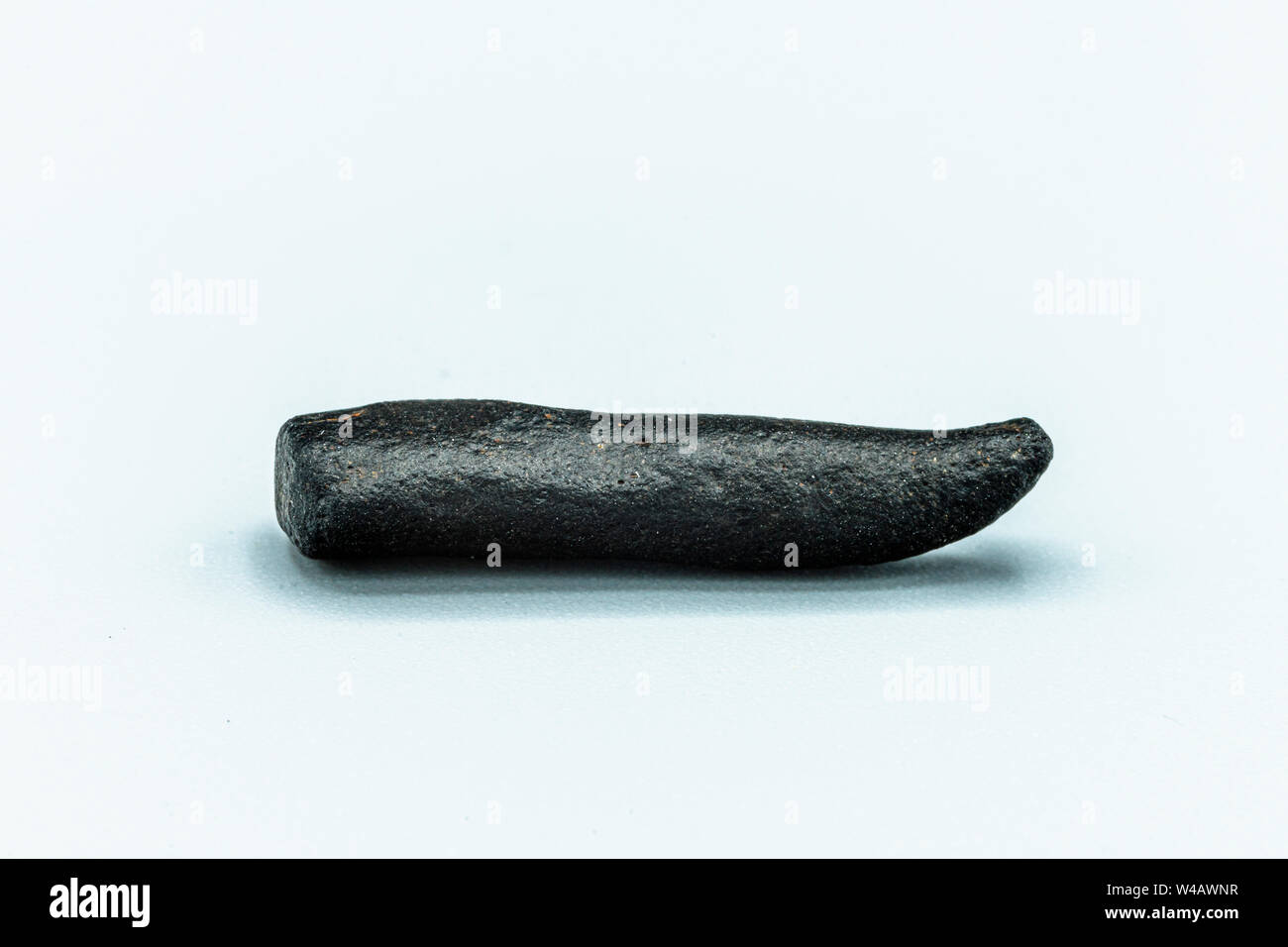 Black magnetic Tektite Meteorite isolated, piece of rock formed in big ...