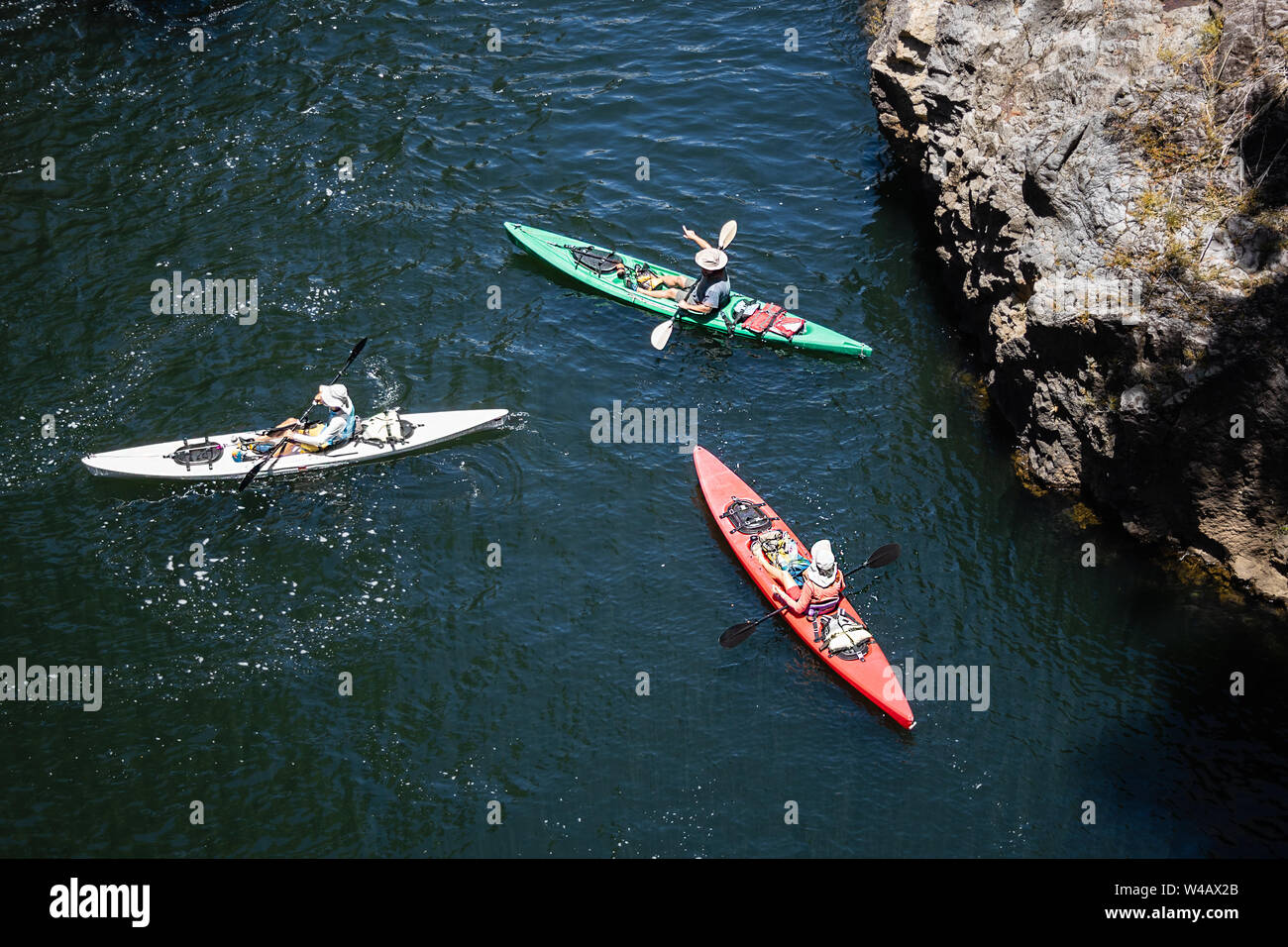 Three people kayaking in river hi-res stock photography and images - Alamy