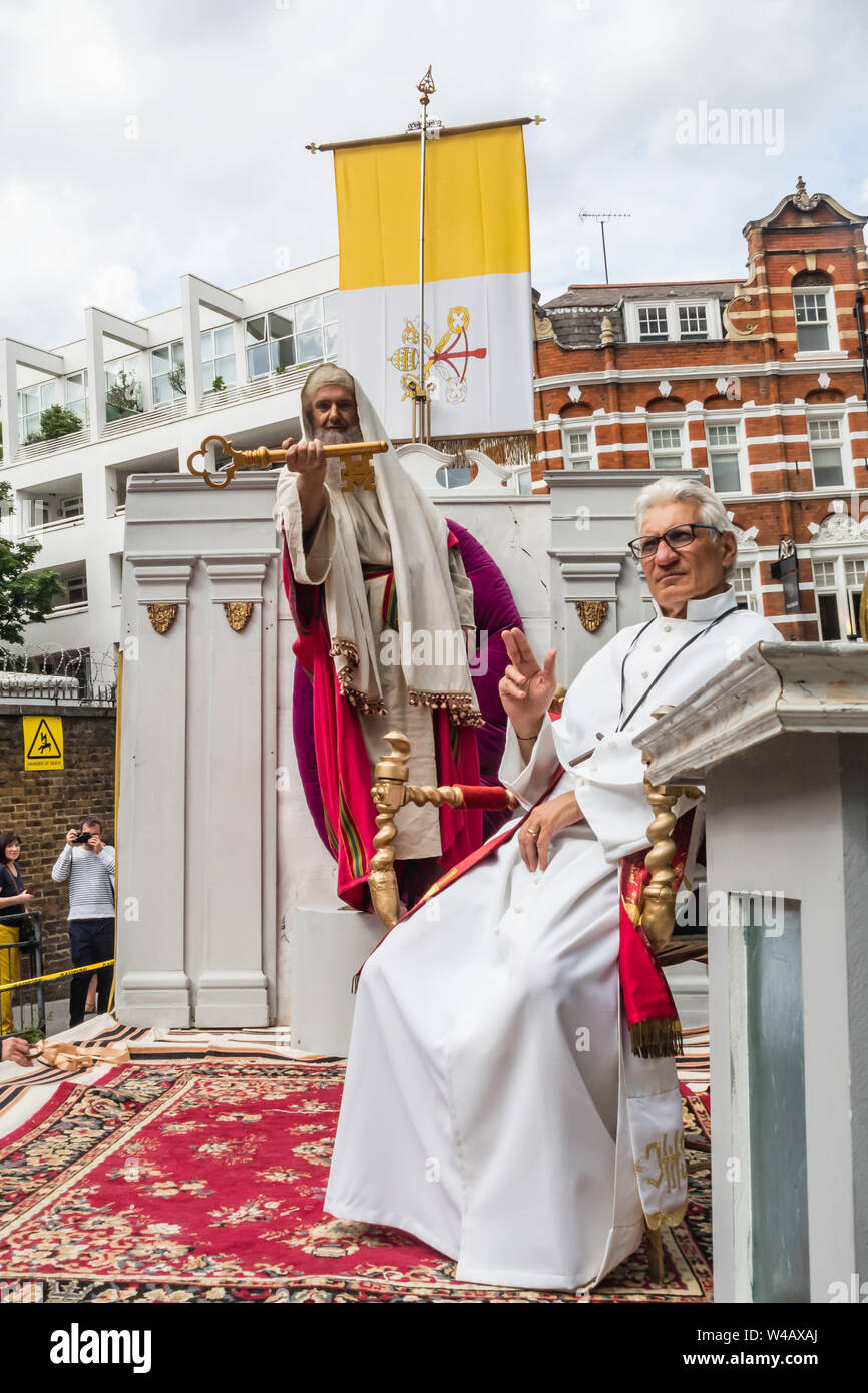 London, UK. 20th July 2019. 'St Peter' and 'Pope Francis' get ready on ...