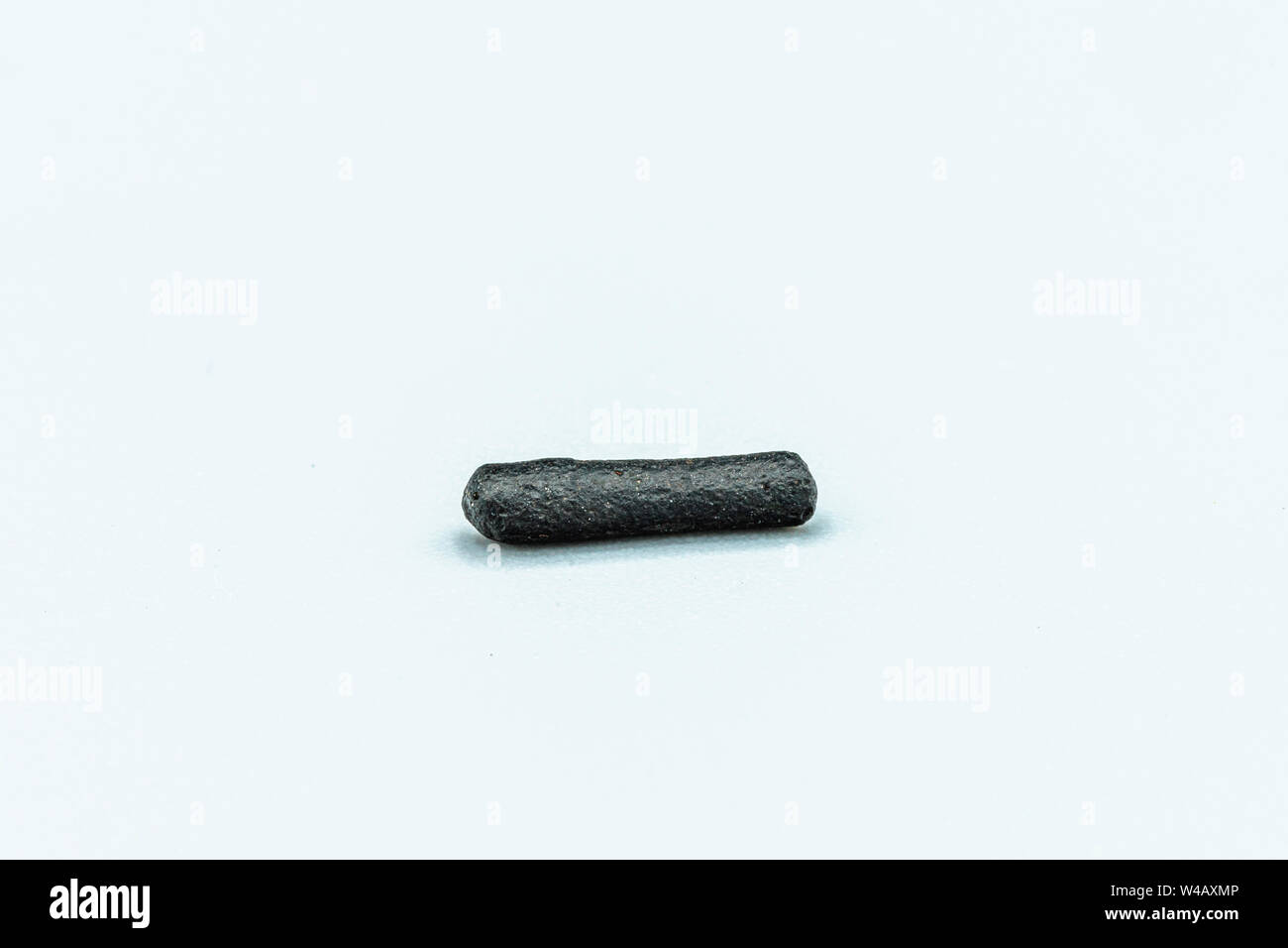 Black magnetic Tektite Meteorite isolated, piece of rock formed in big ...