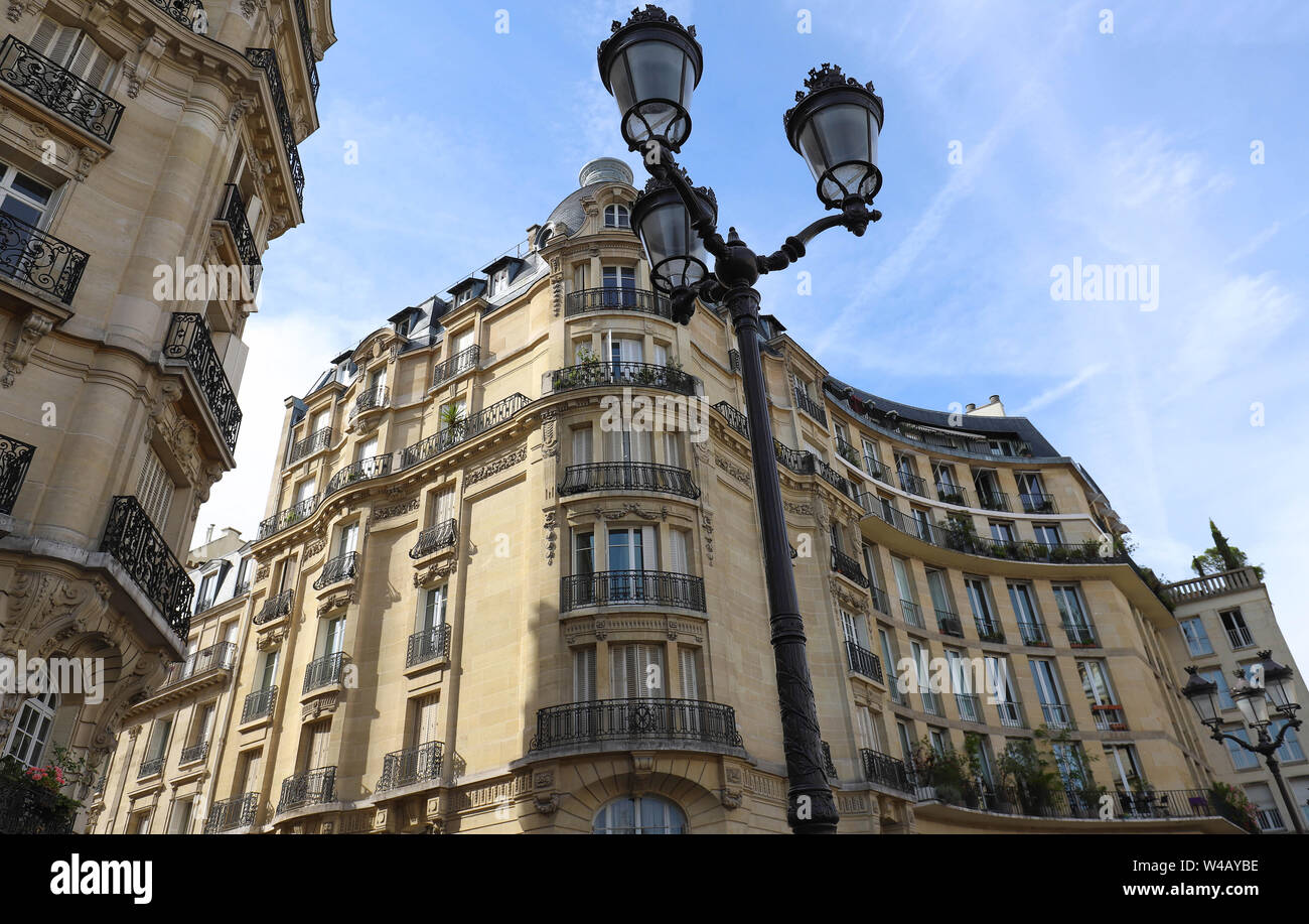 Traditional French house with typical balconies and windows. Paris ...
