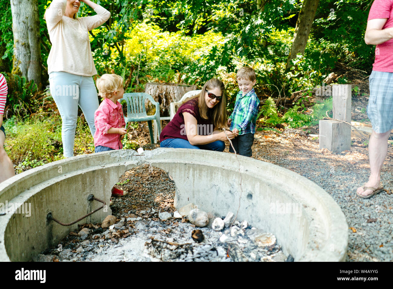 Children gather around hi-res stock photography and images - Alamy
