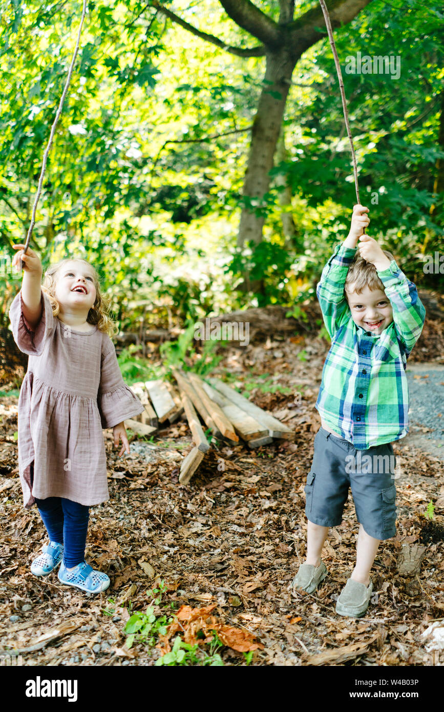 Children playing in the forest sunny hi-res stock photography and ...