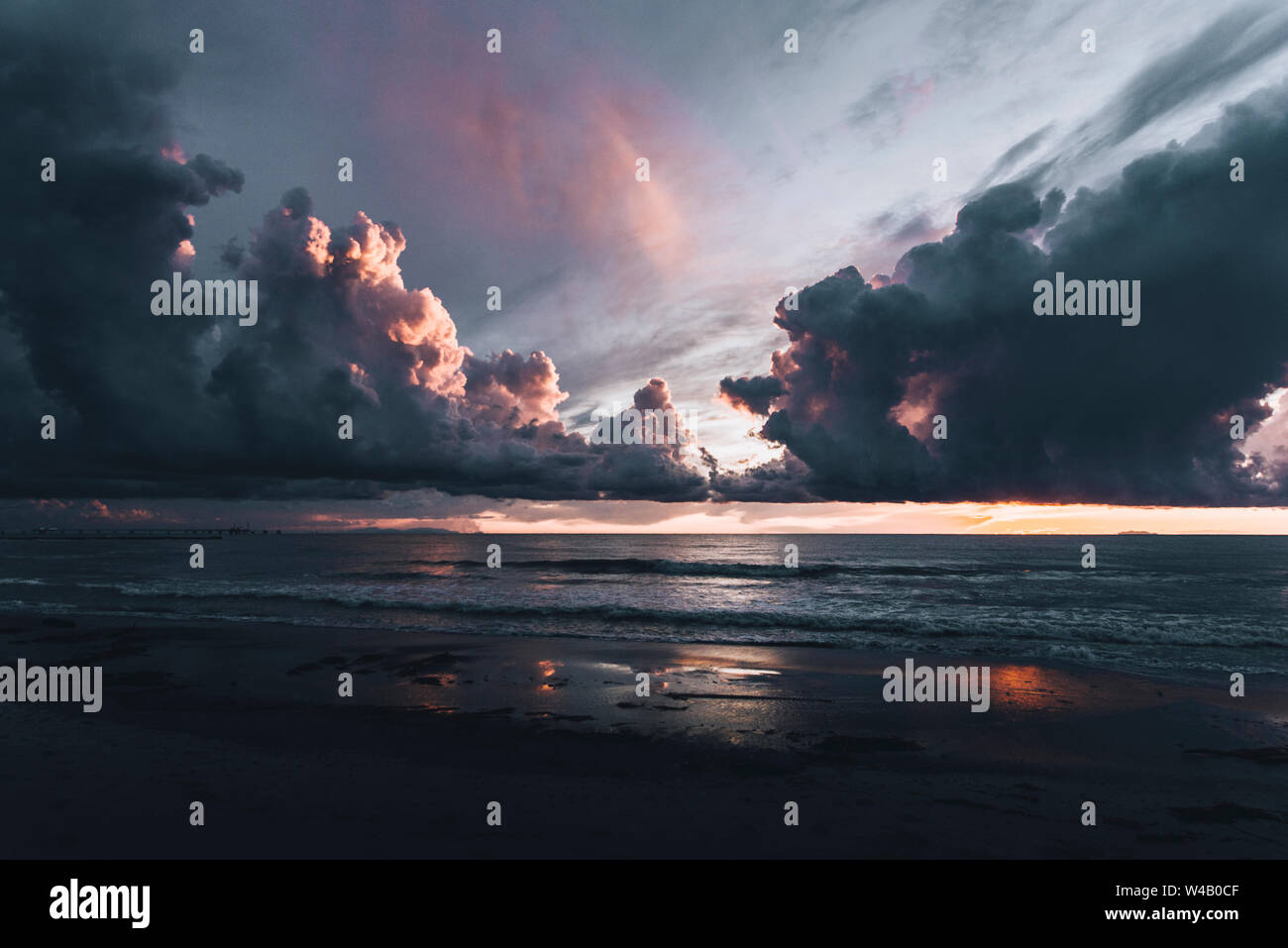 Sunset surf waves clouds hi-res stock photography and images - Alamy