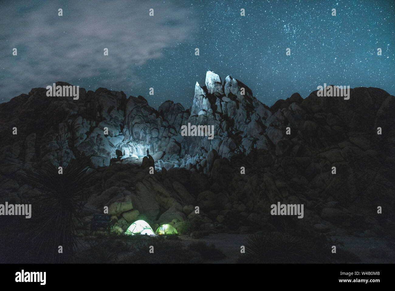 Climbing Higher for Better View Under Night Sky Stock Photo - Alamy