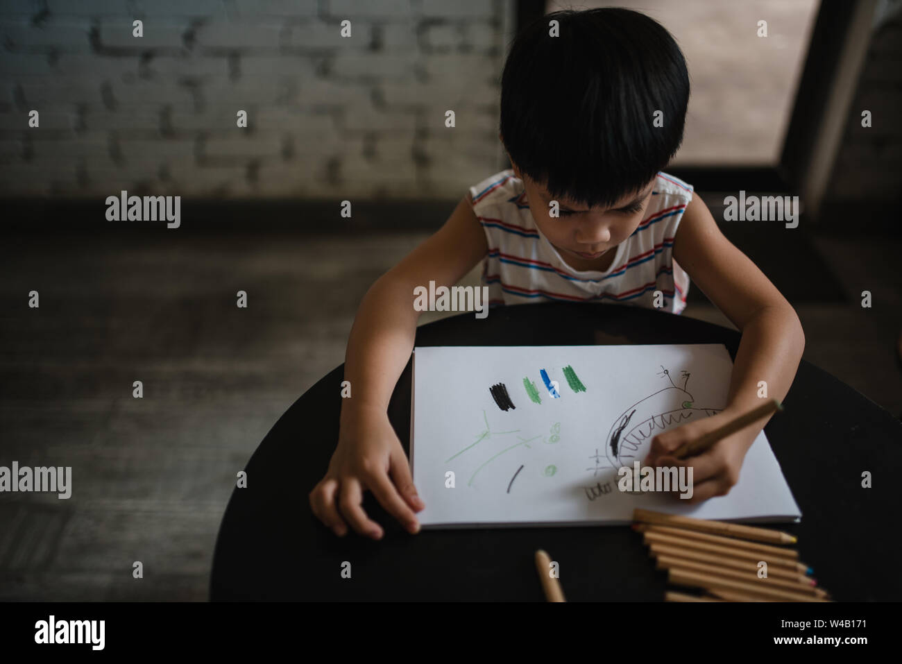 Asian boy drawing hi-res stock photography and images - Alamy
