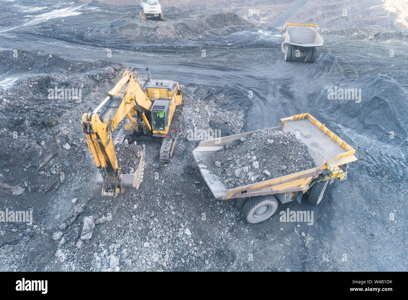 Excavator Loading Coal Truck from Aerial View Stock Photo - Alamy