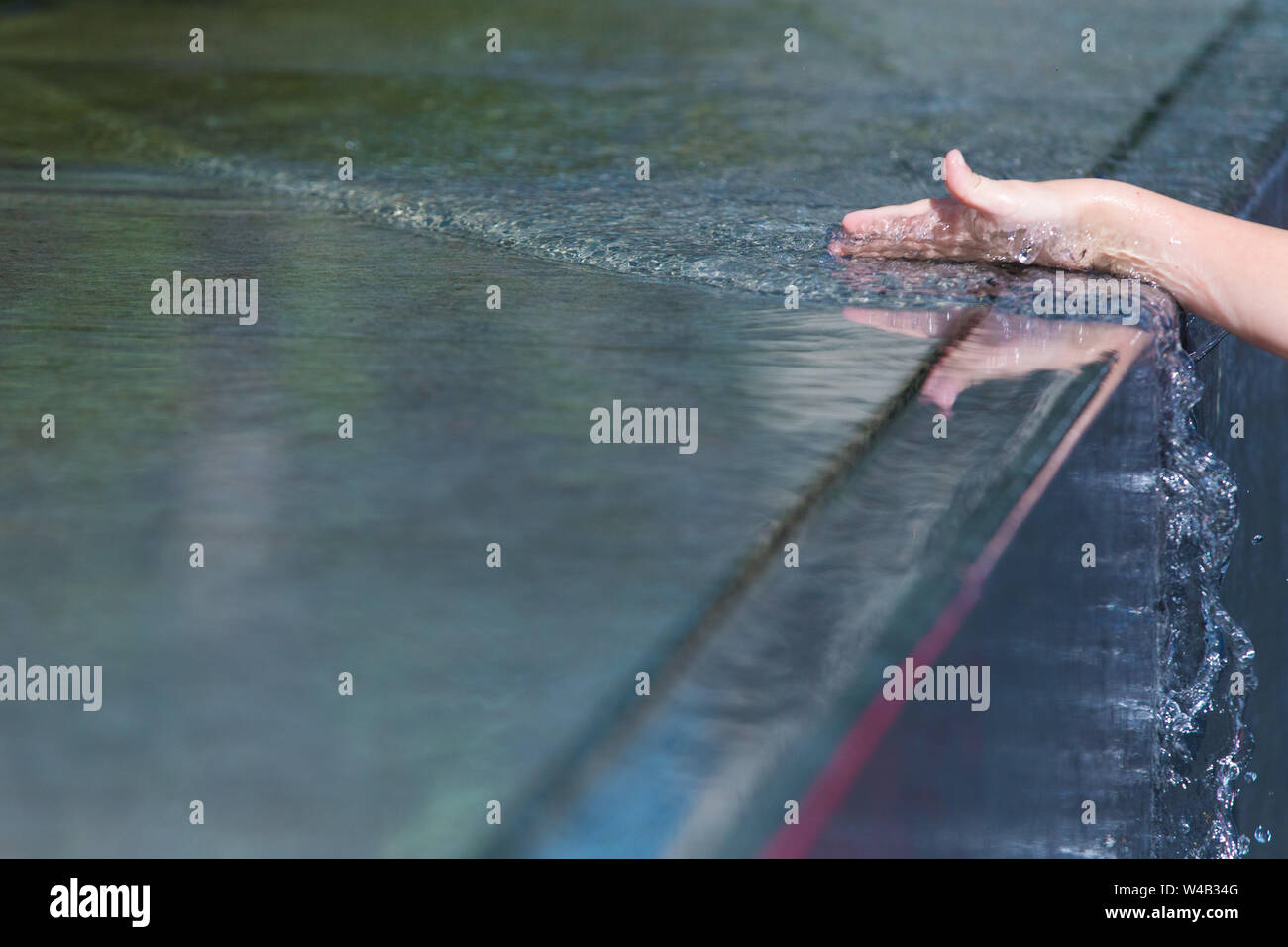 Finger touching water hi-res stock photography and images - Alamy
