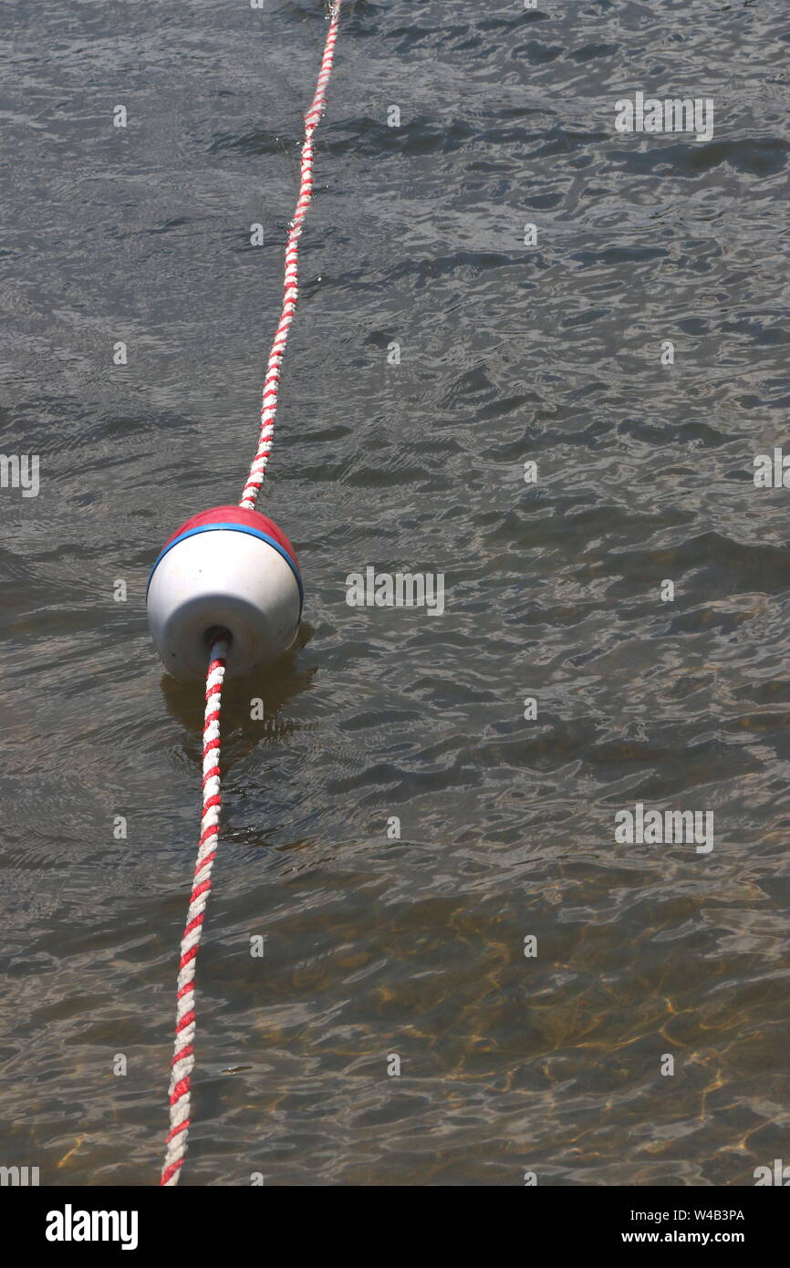 Long rope with attached red and white buoys, Pine Mountain Lake ...