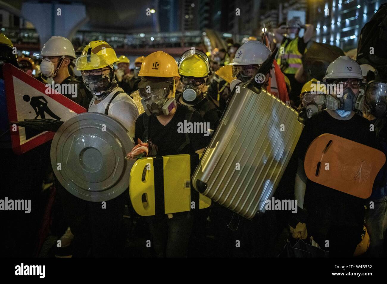 Protesters ready to face riot police with improvised shields ...