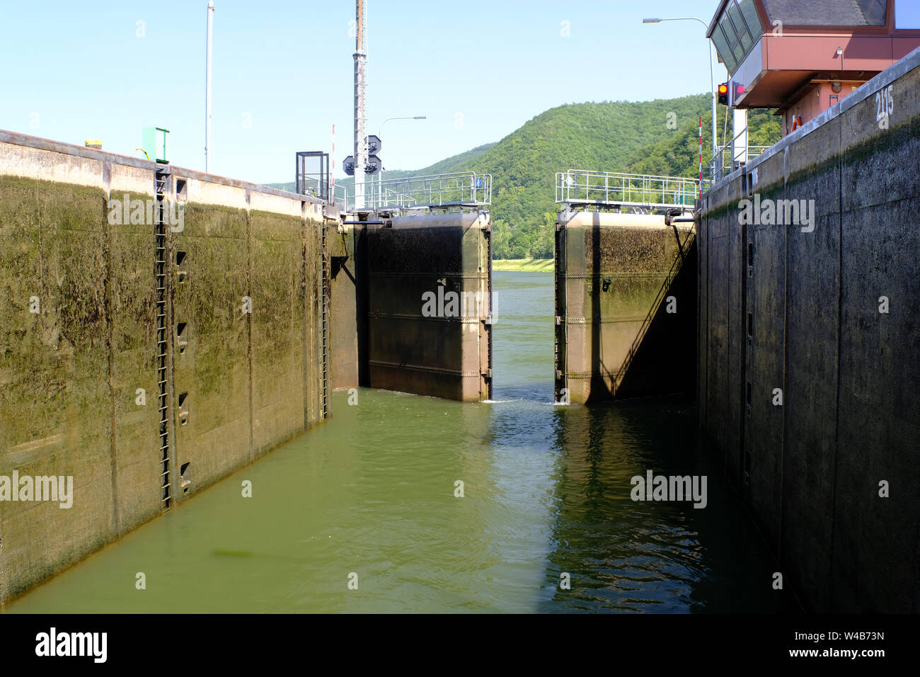 Lock door opening on canal along the Moselle River in Germany Stock ...
