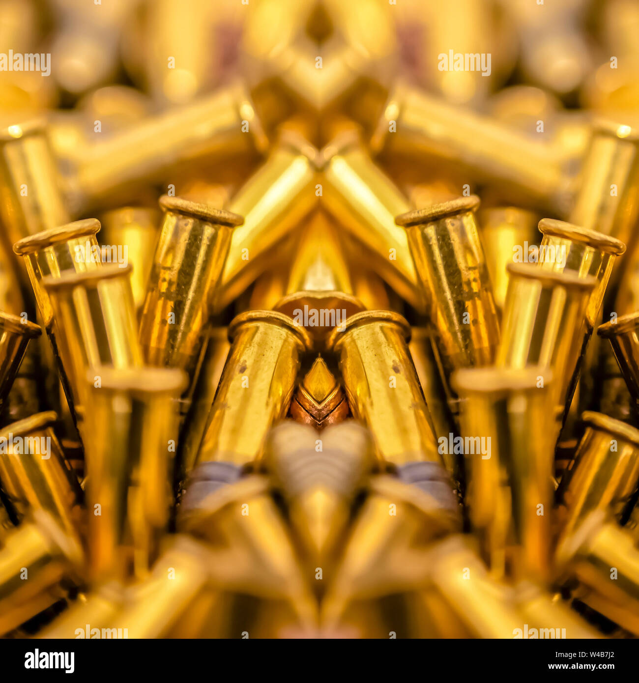 Pile of bullets on an axis of symmetry. Geometric kaleidoscope pattern ...