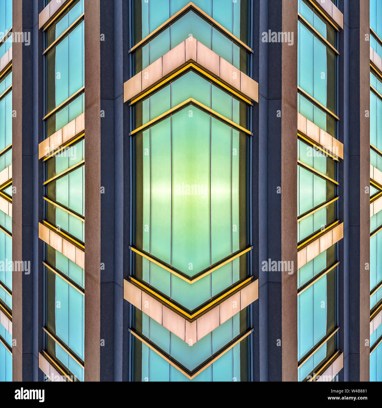 Shiny exterior windows of an office building. Geometric kaleidoscope ...