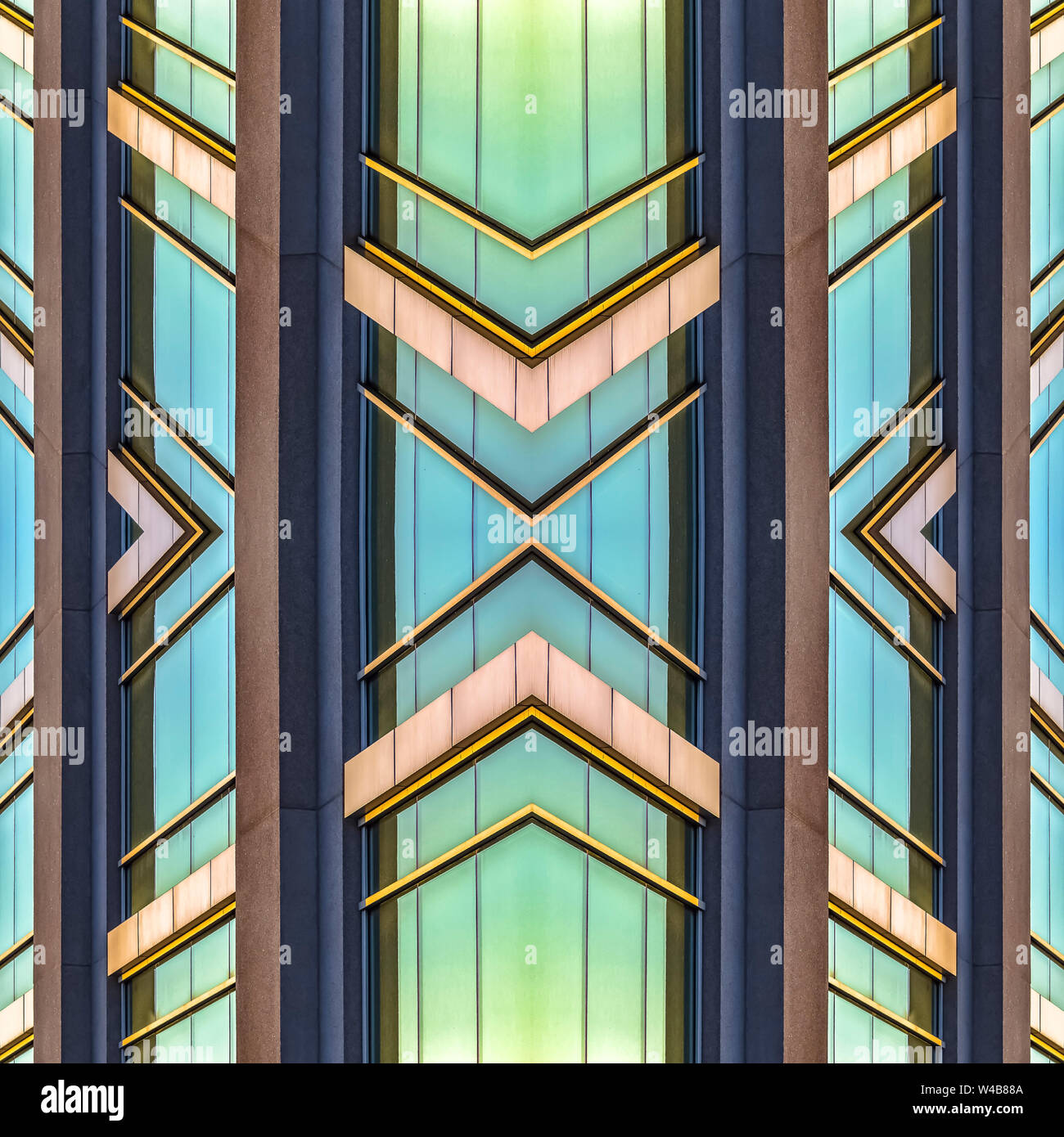 Shiny windows of office building downtown. Geometric kaleidoscope ...