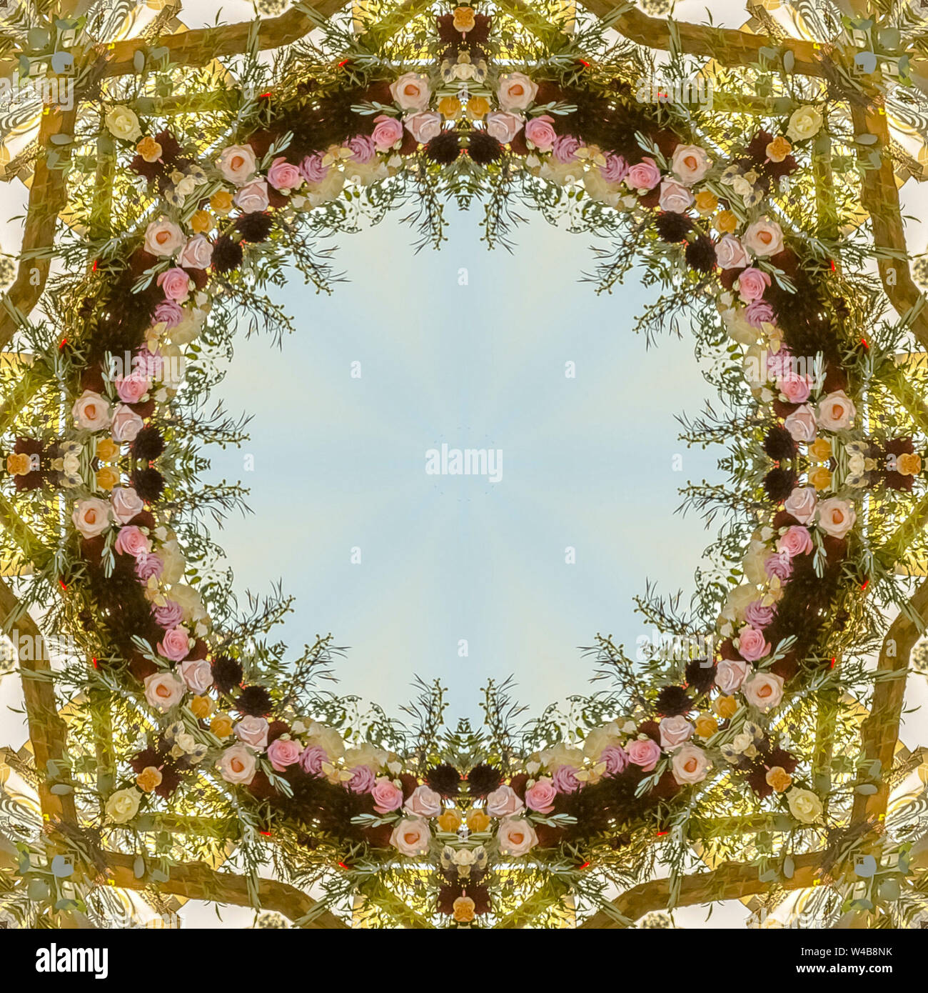 Circular angular floral design made from wedding flowers at sunset ...