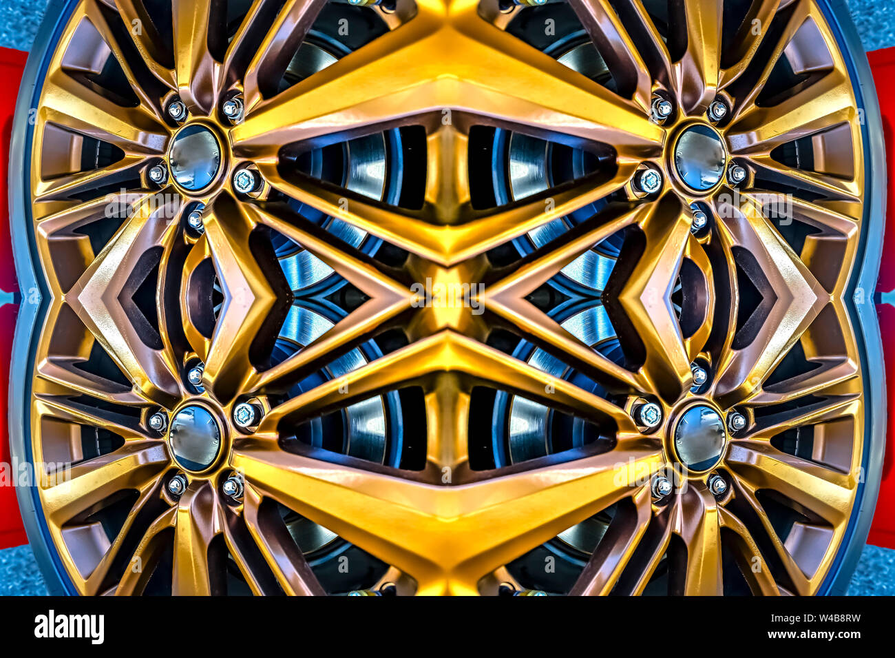 Rims of a sports car golden and shiny. Geometric kaleidoscope pattern ...