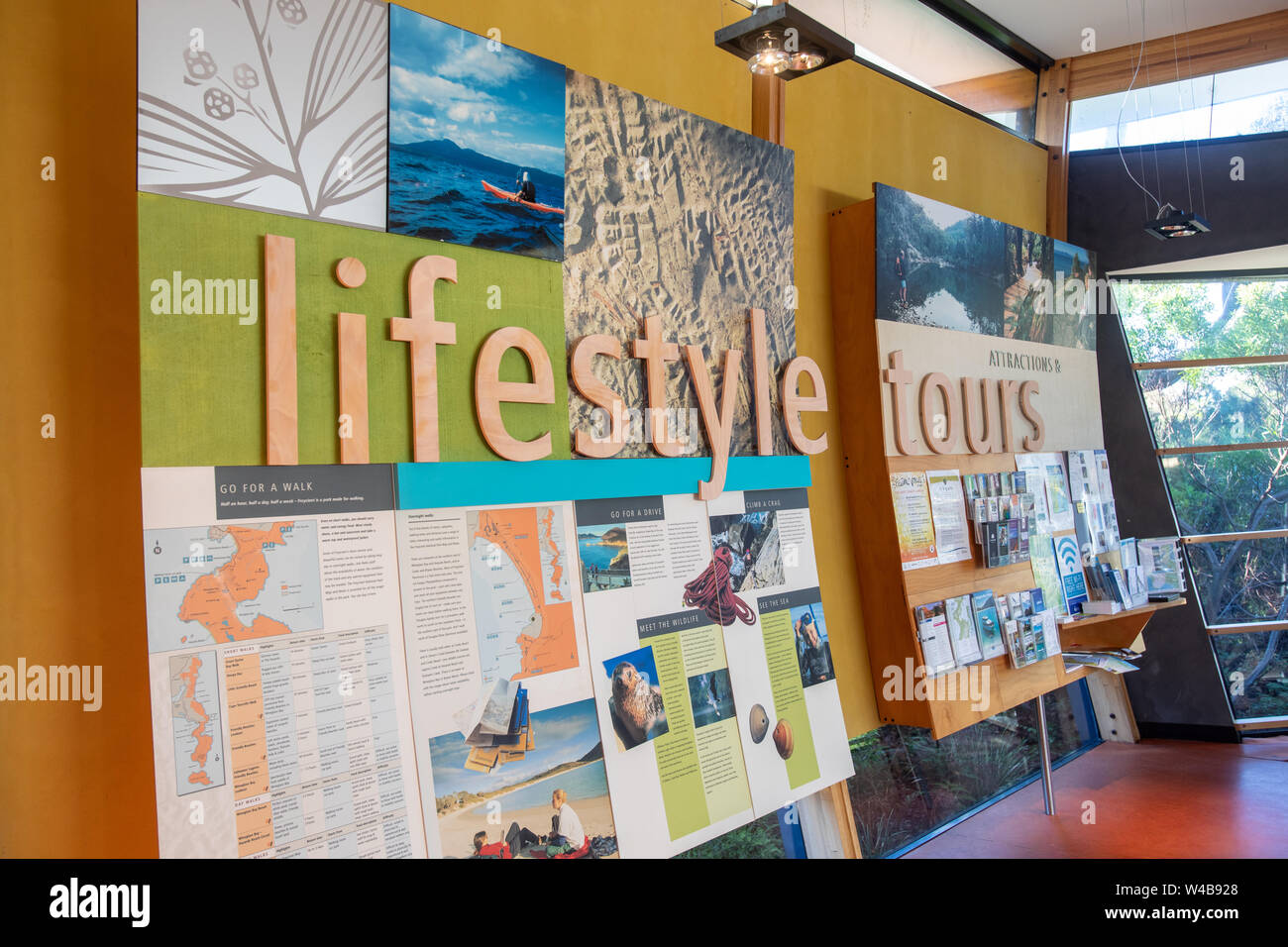Entrance and visitors inside tourist information office hi-res stock ...