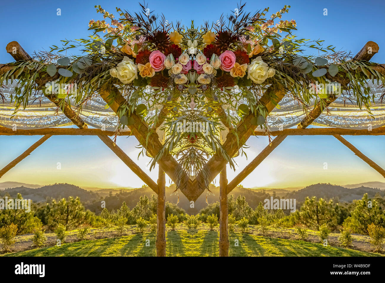 Chuppah at a Jewish wedding sunset views behind with photo reflected in ...