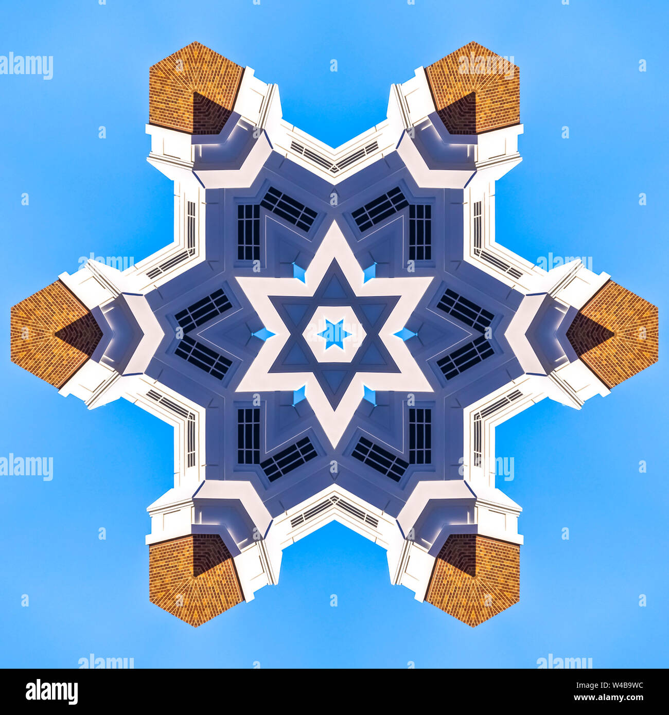 Church steeple with brick formed into star. Geometric kaleidoscope ...