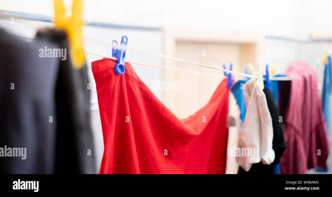 drying the clothes hanging in laundry, hanging after washing Stock ...