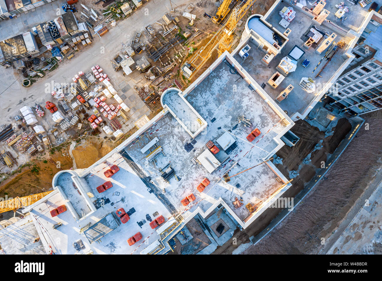 aerial top view of construction site with different machinery and ...