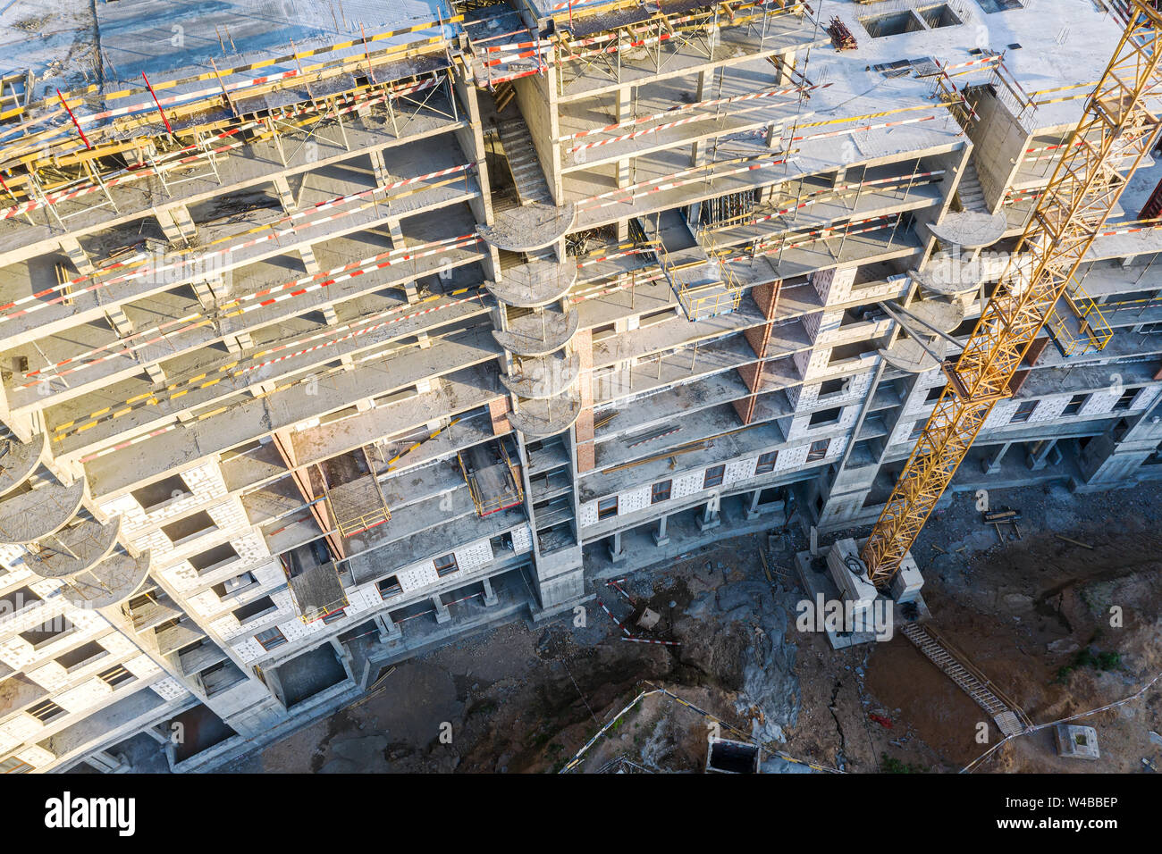 aerial top view of new modern apartment building under construction ...